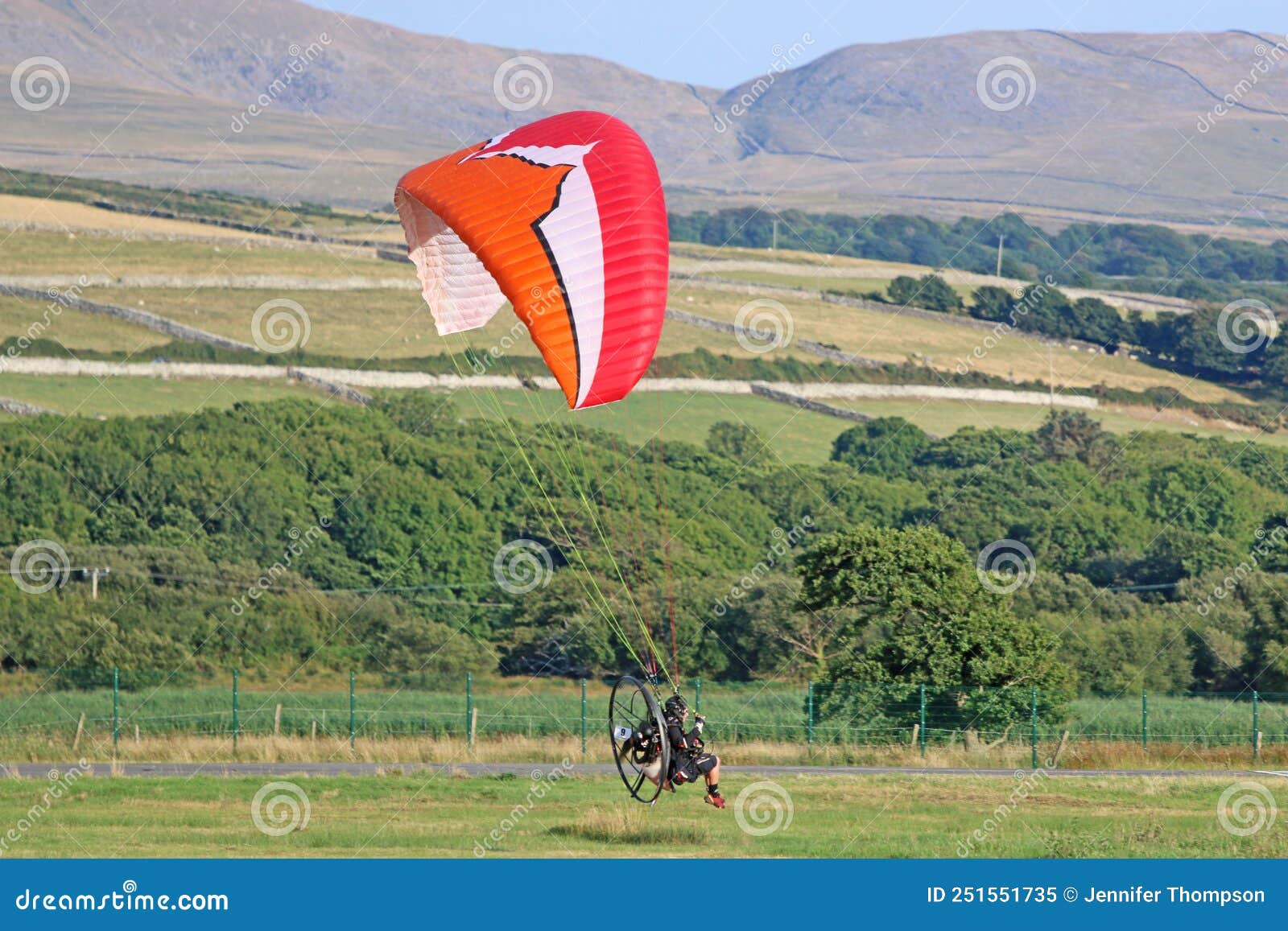 Paramotor Pilot Taking Off from a Field Stock Image - Image of ...