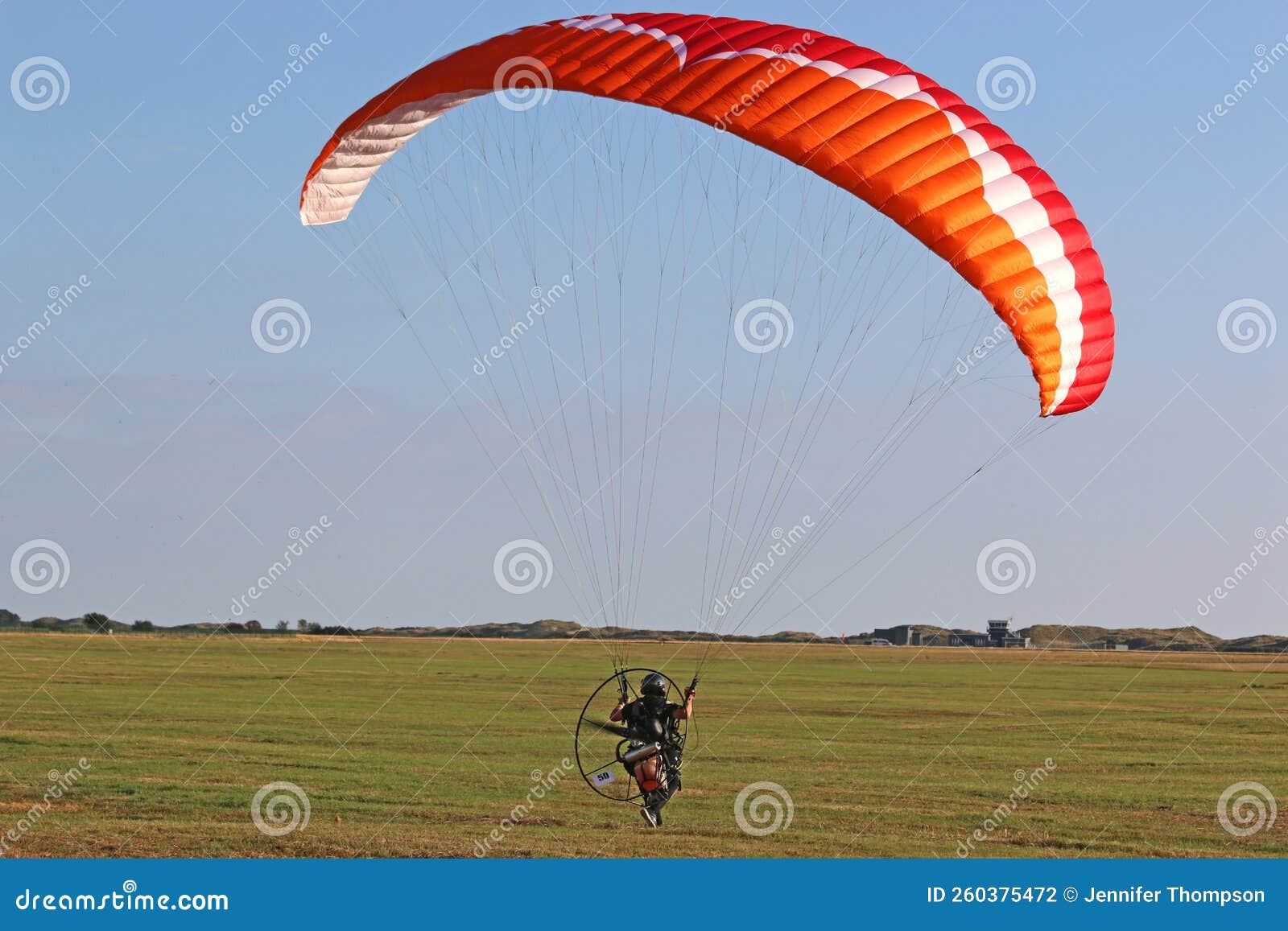 Paramotor Pilot Taking Off from a Field Stock Photo - Image of land ...