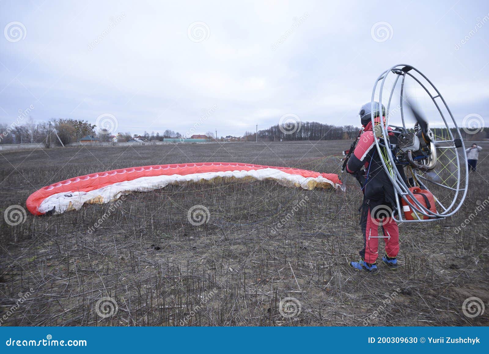 Paramotoring. Paramotorist Checking Rigging for Start To Fly Editorial ...
