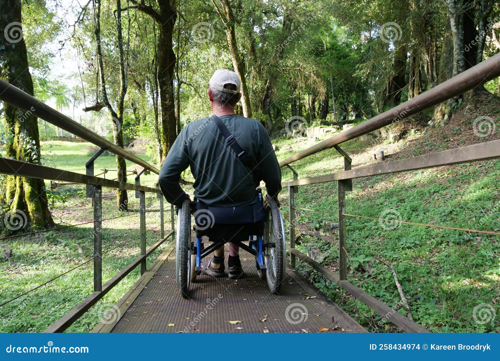 Paraplegic Using Ramp Made for Wheelchair Users in Park Stock Photo ...