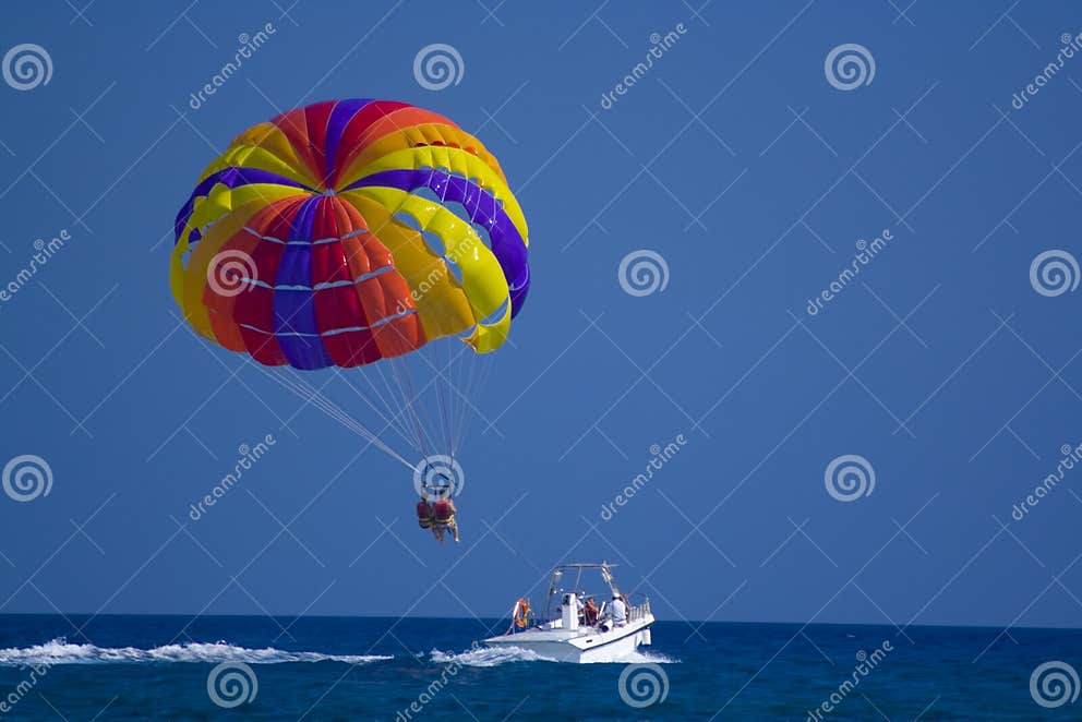 Parasailing stock image. Image of flying, boat, outdoors - 21735027