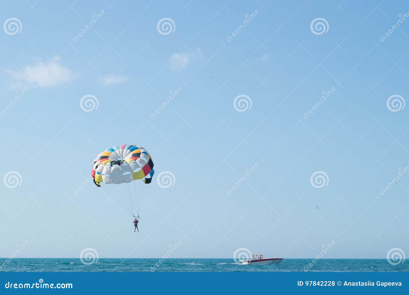 Parasailing is Above the Sea. Focus on a Parachute Stock Photo - Image ...