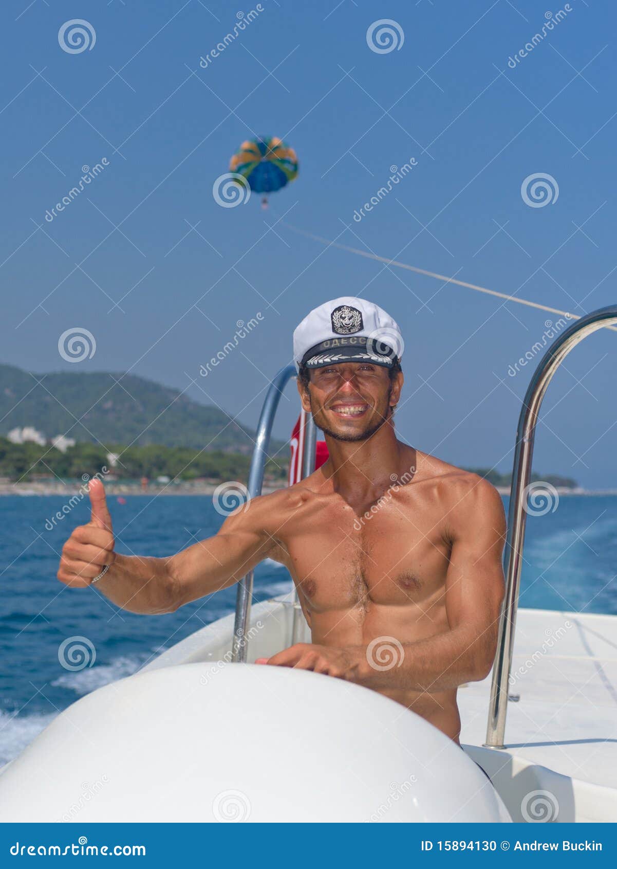 Parasailing captain stock photo. Image of muscle, sailor - 15894130