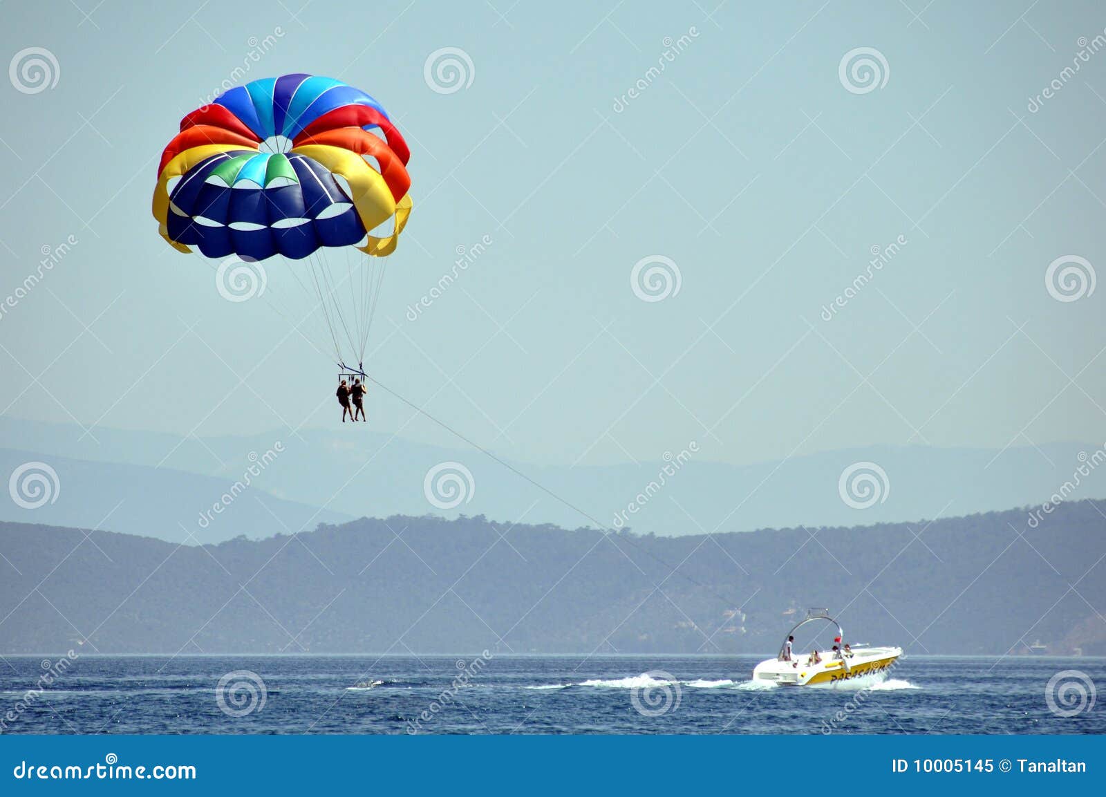 Parasailing Parachutte and Boat Stock Image - Image of parachute, wind ...