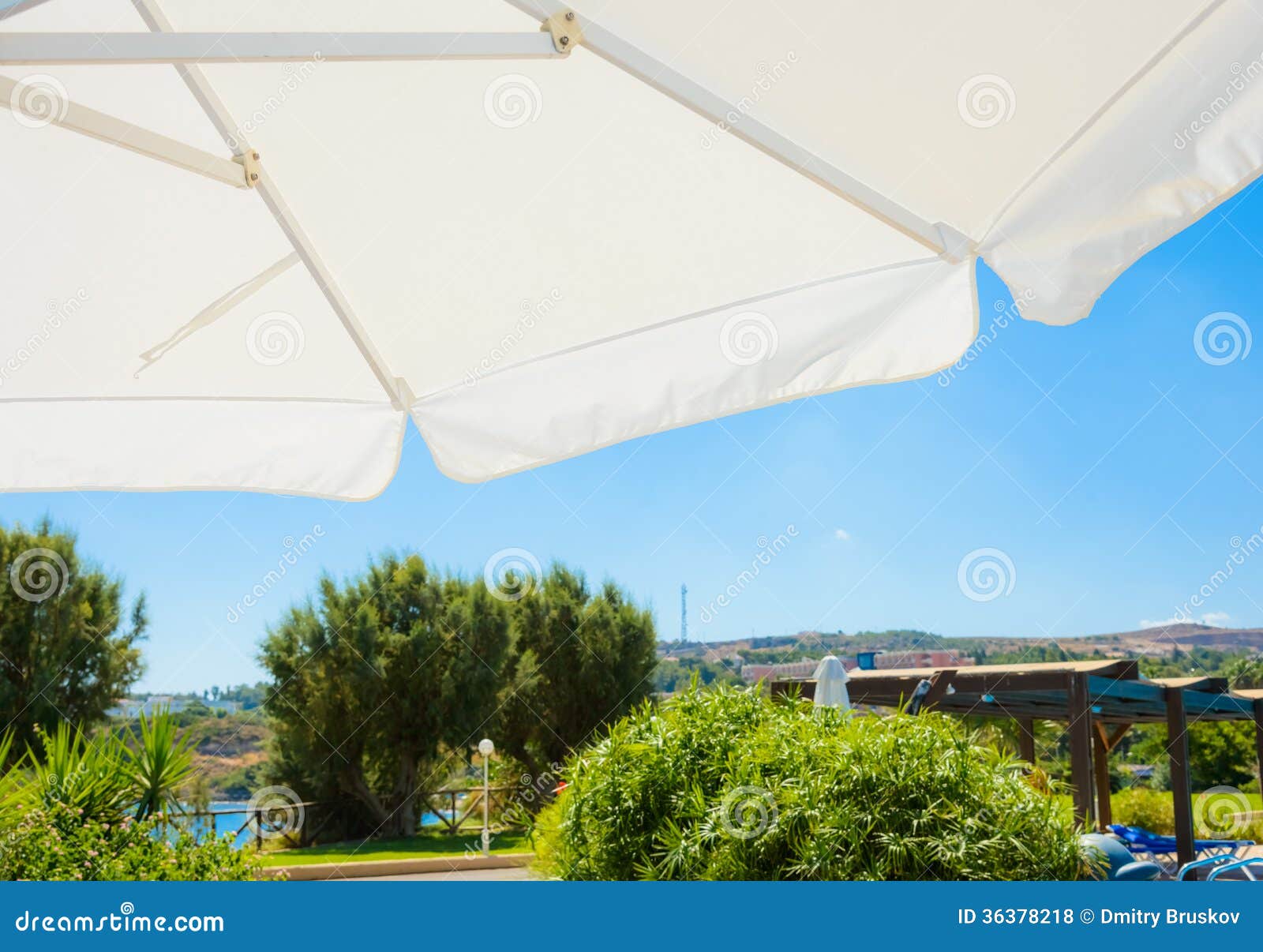 Parasol Against the Blue Sky with Cloud Stock Photo - Image of parasol ...