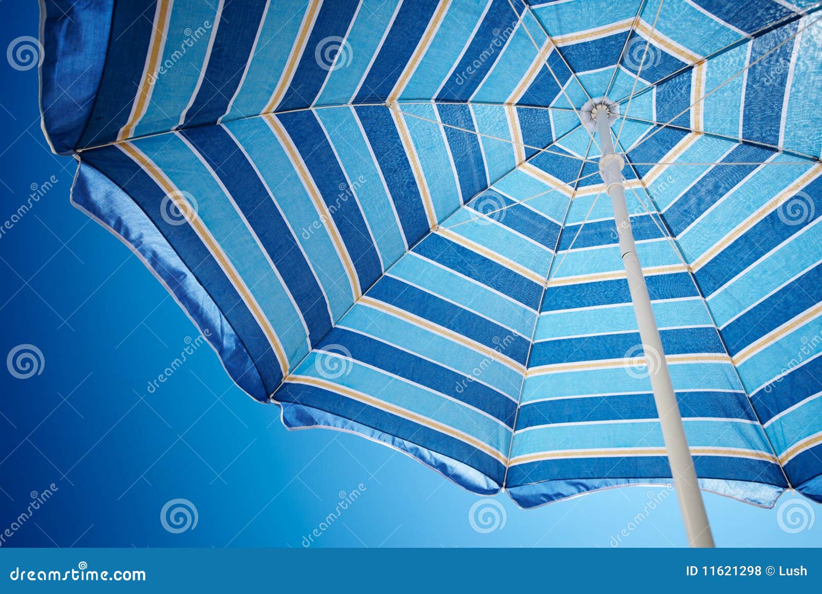 Parasol Against Deep Blue Sky Stock Photo - Image of outdoor, tranquil ...