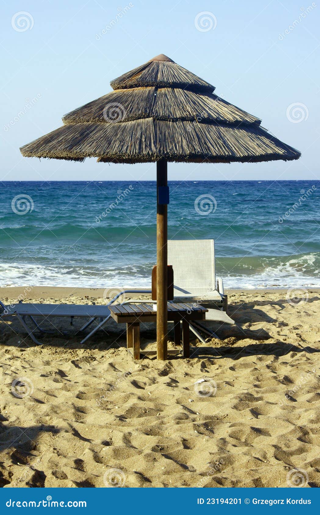 Parasol on the beach stock image. Image of stone, water - 23194201