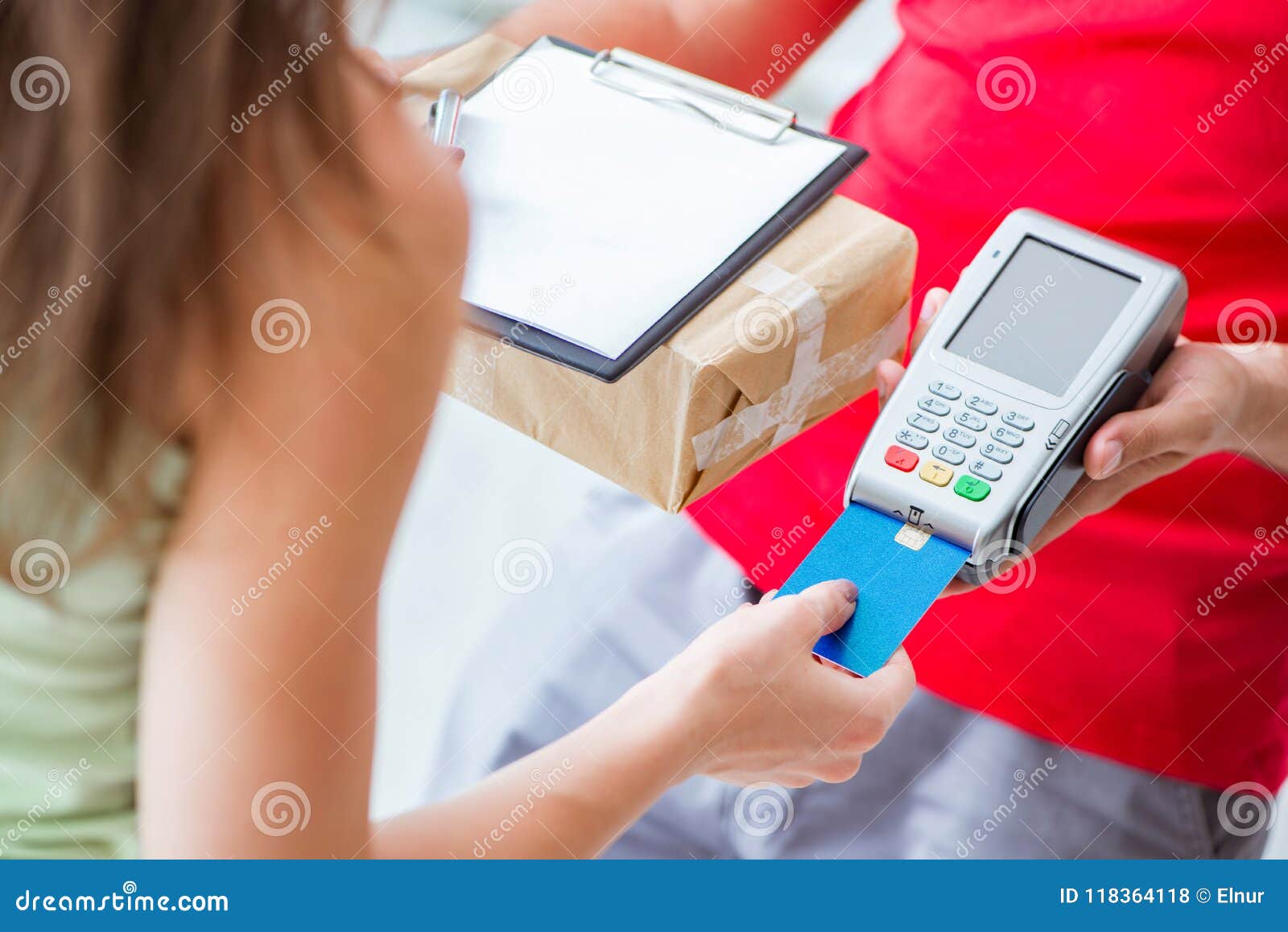 The Parcel Delivery Being Paid with Pos and Credit Card Stock Photo ...