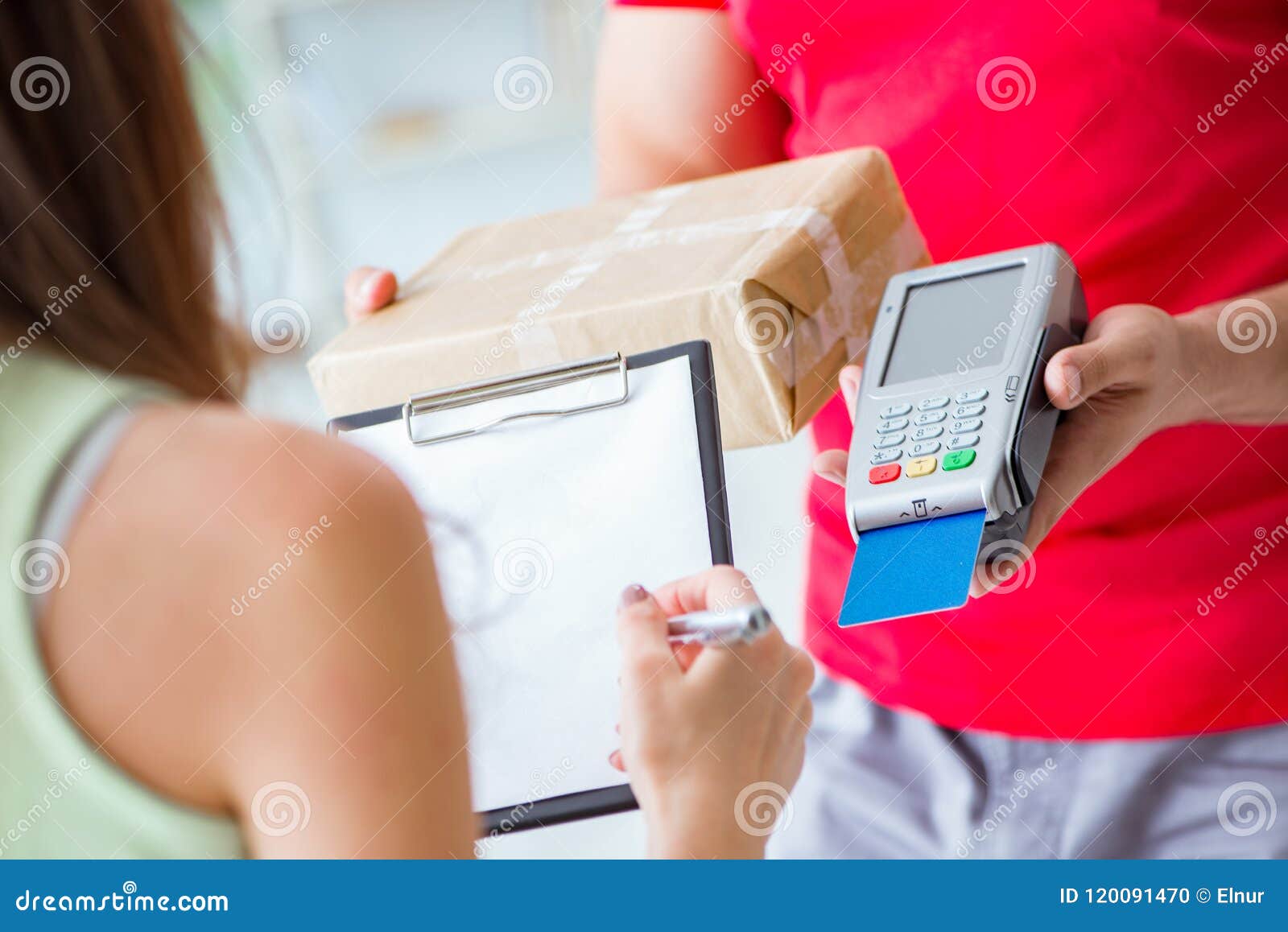 The Parcel Delivery Being Paid with Pos and Credit Card Stock Photo ...
