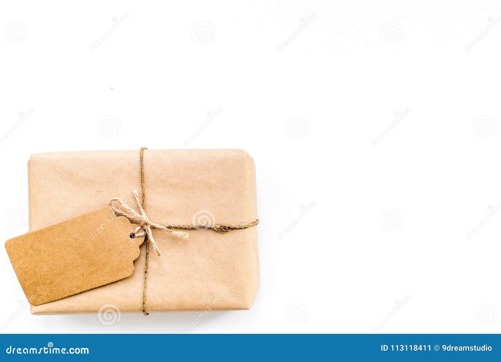 Parcel Packaging Box Wrapped with Craft Paper with Empty Label Mockup ...