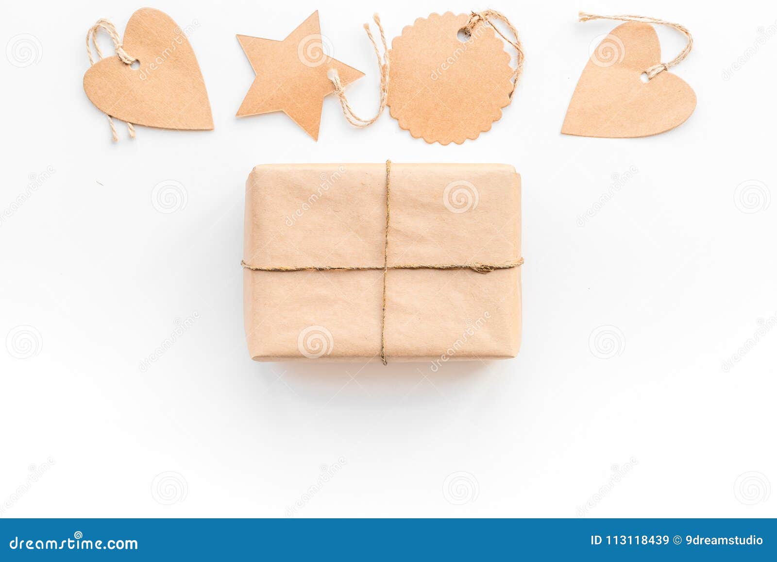 Parcel Packaging Box Wrapped with Craft Paper with Empty Label Mockups ...