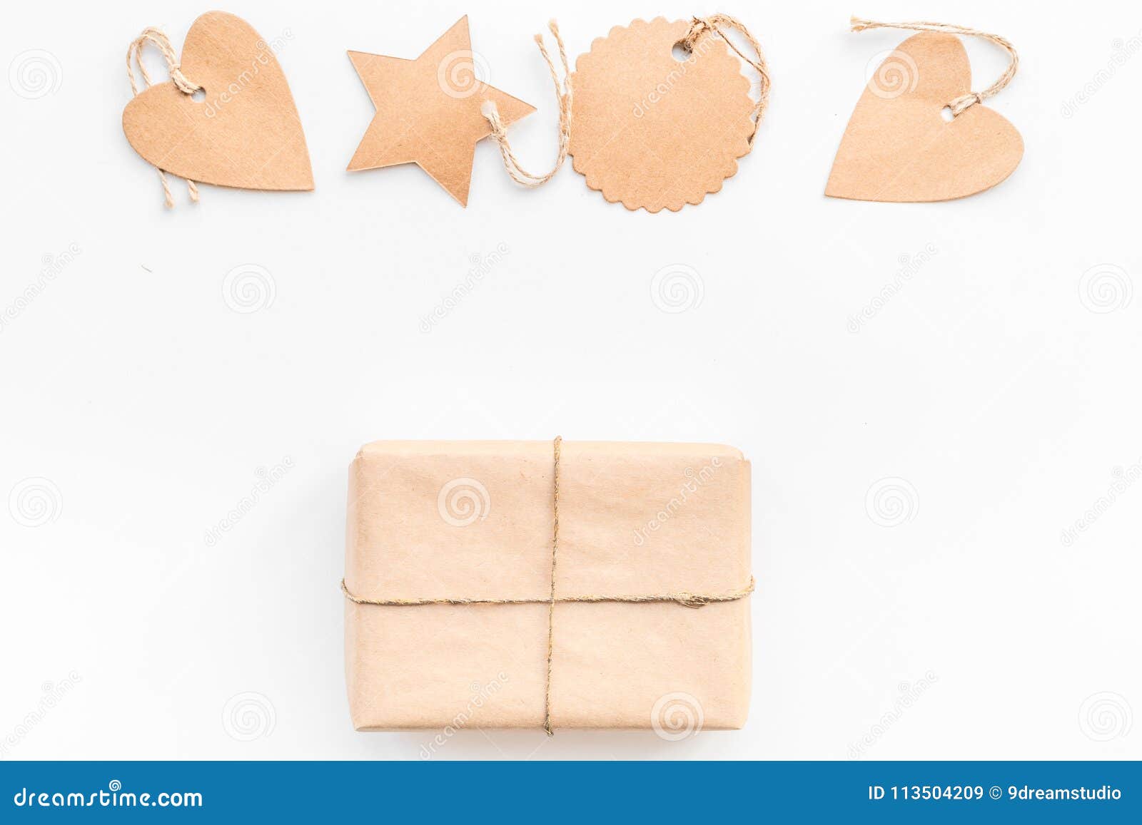 Parcel Packaging Box Wrapped with Craft Paper with Empty Label Mockups ...