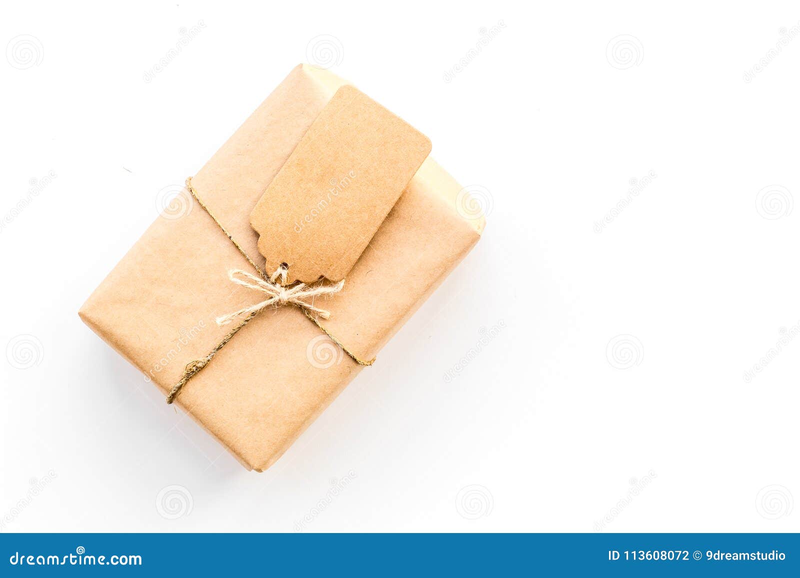 Parcel Packaging Box Wrapped with Craft Paper with Empty Label Mockup ...