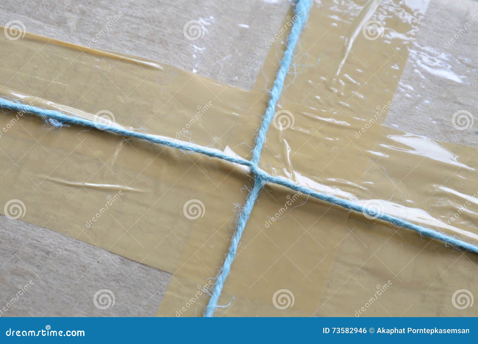Parcel Rope Tying Around Brown Postal Box Stock Photo - Image of wrap ...
