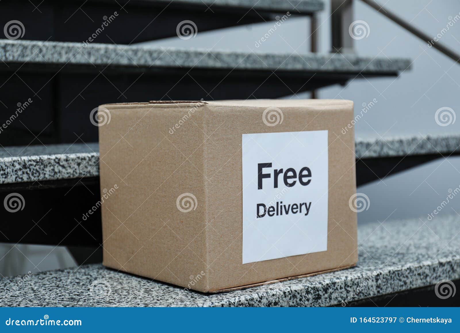 Parcel with Sticker Free Delivery on Stairs Stock Image - Image of ...