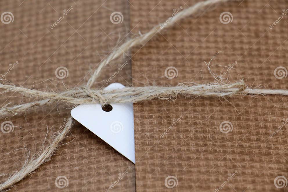 Parcel Tied with White String with Address Label Attached Stock Image ...