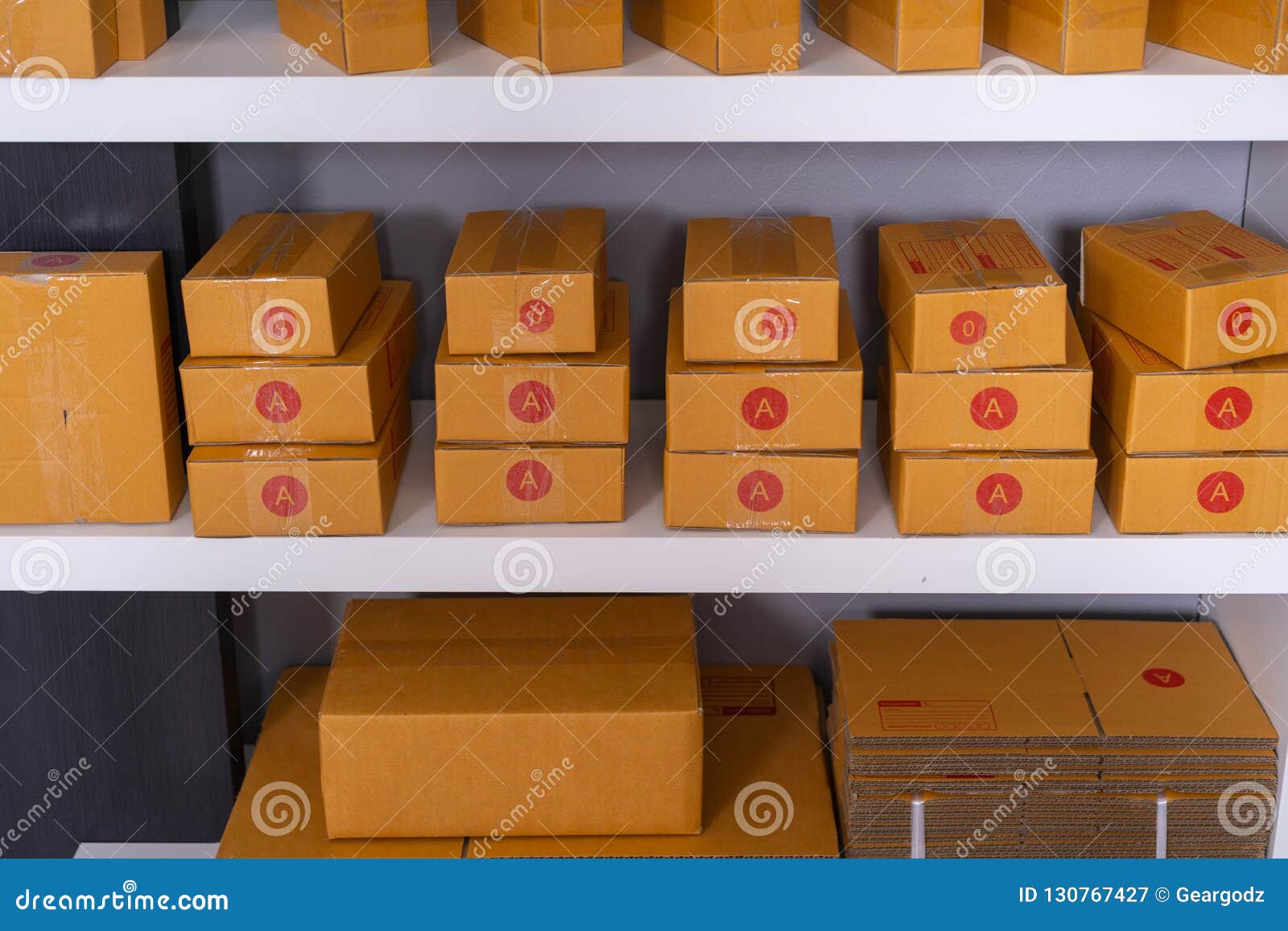 Parcels on Shelf Ready for Shipment To Client in Home Office Stock ...