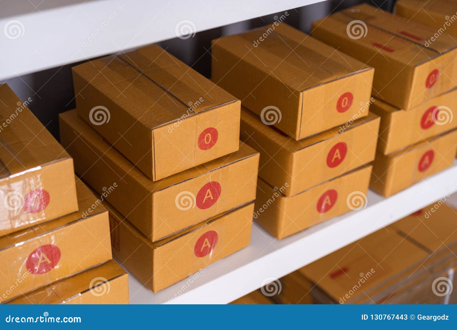 Parcels on Shelf Ready for Shipment To Client in Home Office Stock ...