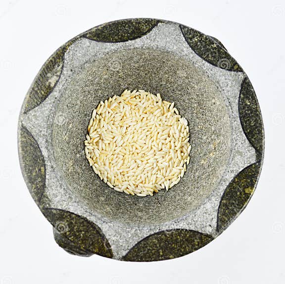 Parched rice in a mortar stock photo. Image of garnish - 31851404