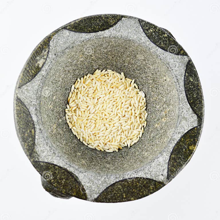 Parched rice in a mortar stock photo. Image of garnish - 31851404