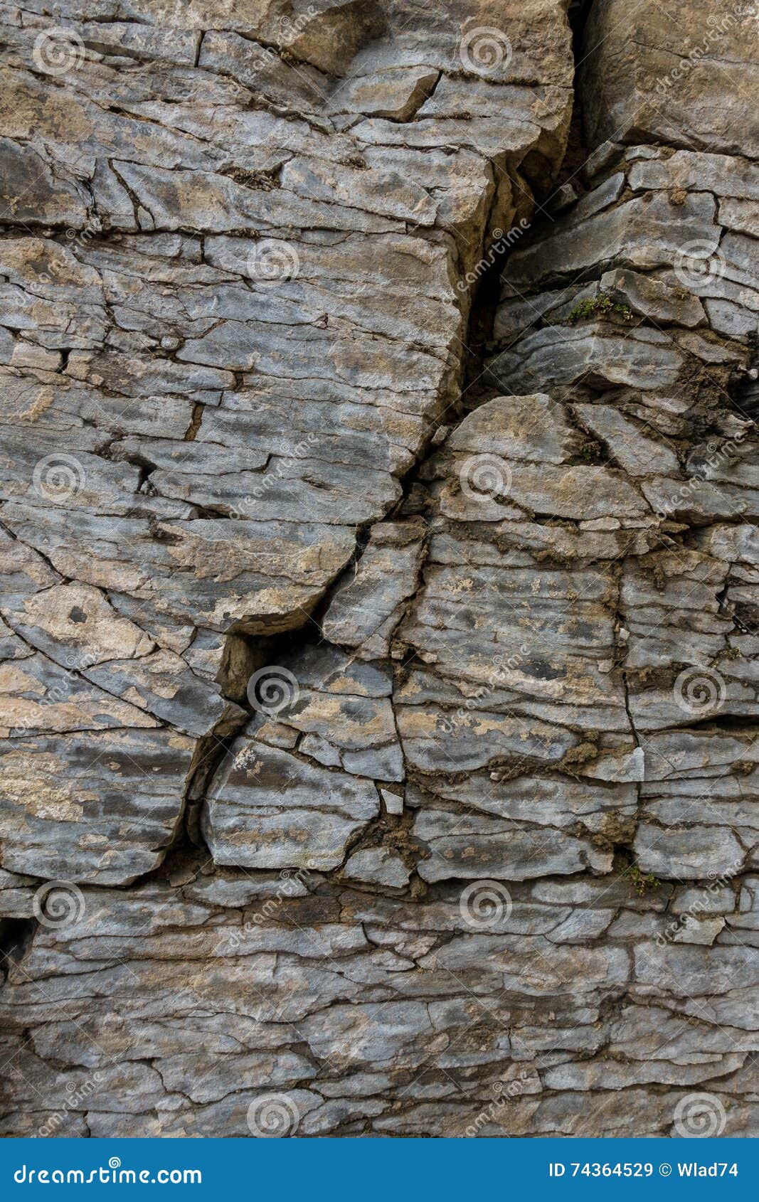Pared De Piedra De La Roca Con Las Grietas Imagen de archivo - Imagen ...