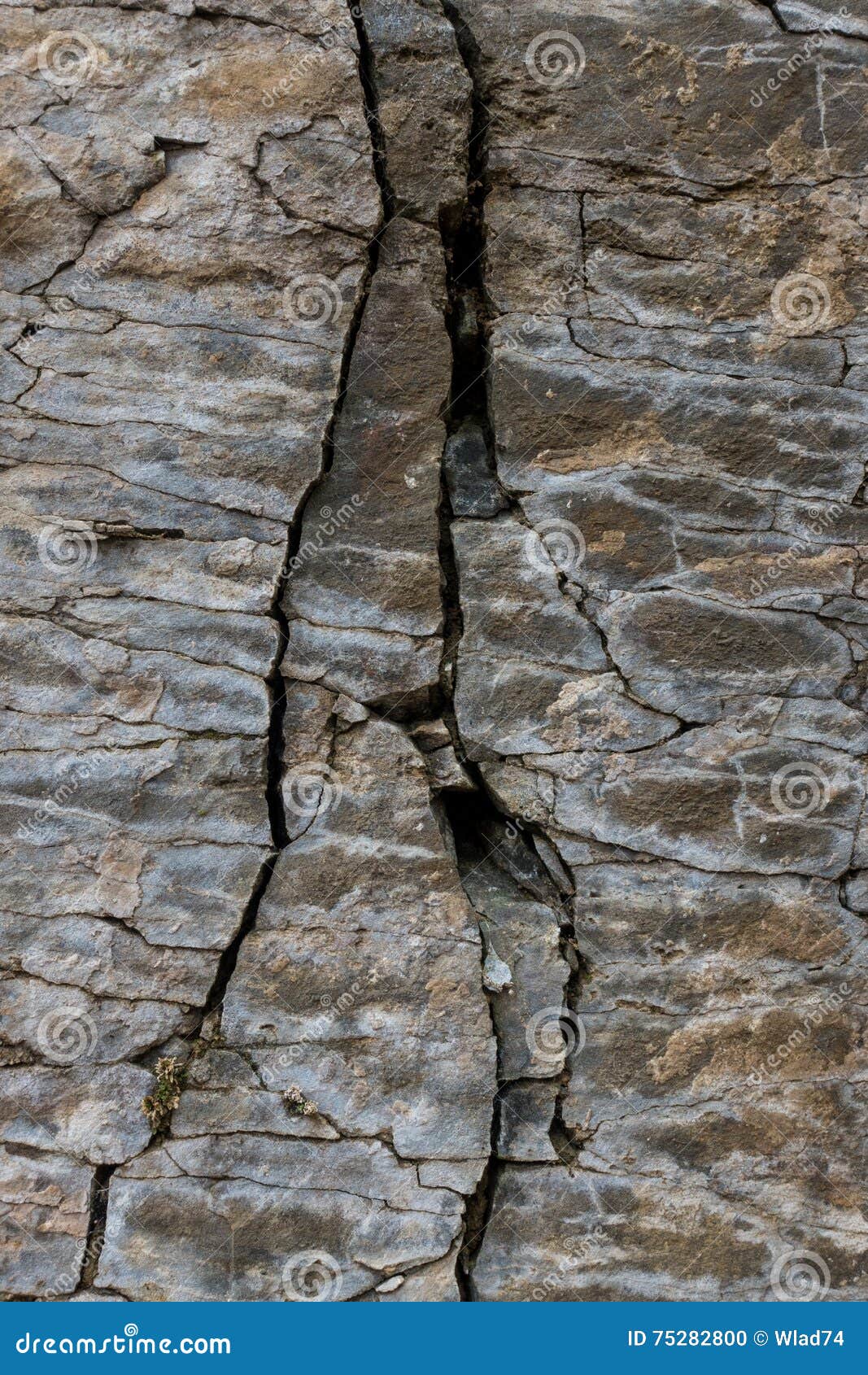 Pared De Piedra De La Roca Con Las Grietas Foto de archivo - Imagen de ...