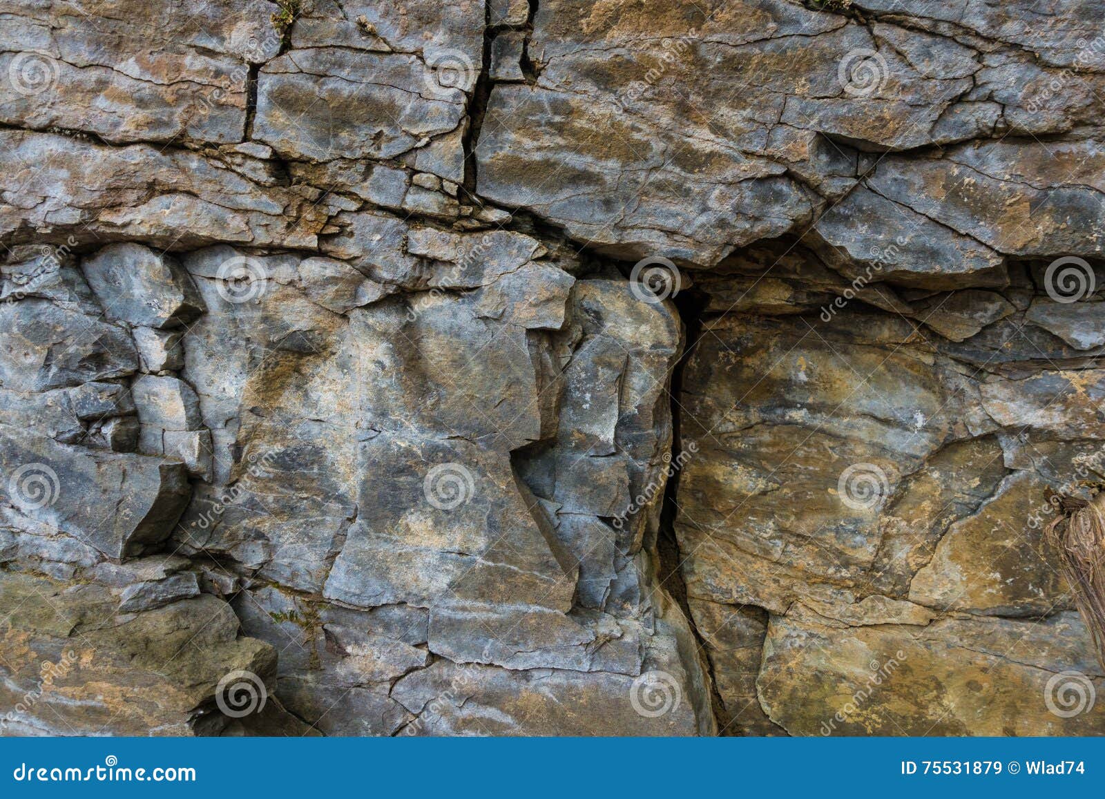 Pared De Piedra De La Roca Con Las Grietas Imagen de archivo - Imagen ...