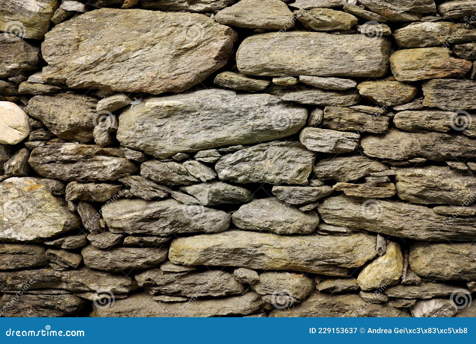 Pared de piedra natural imagen de archivo. Imagen de piedras - 229153637