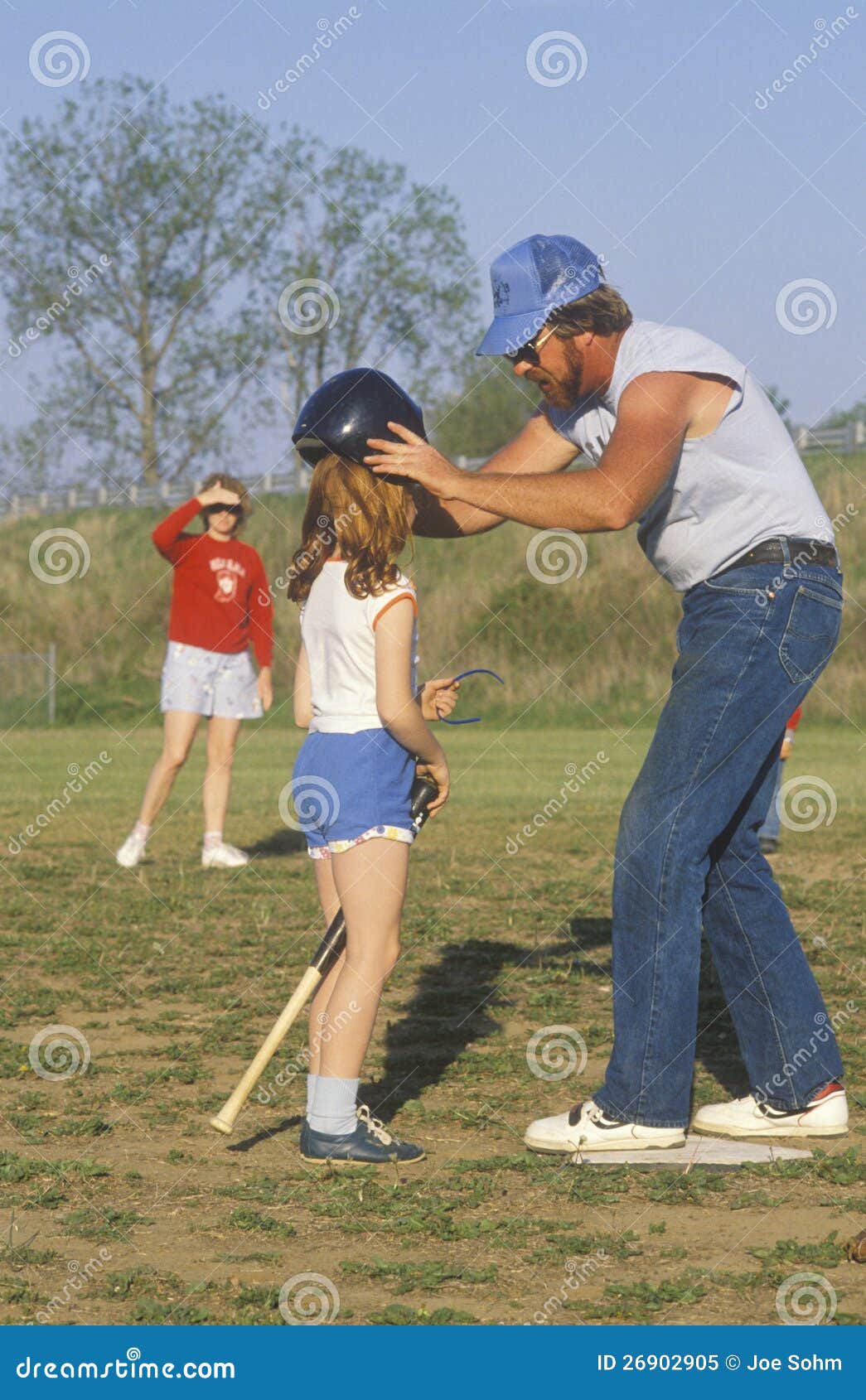 Parent Coaching Girls Baseball Game Editorial Image - Image of parent ...