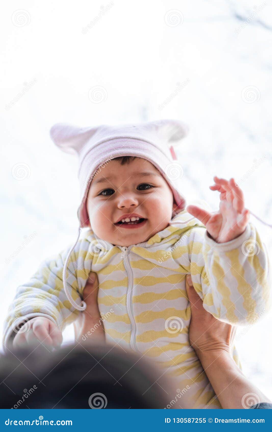 Parent Hands Holding a Laughing Child in the Air Stock Image - Image of ...