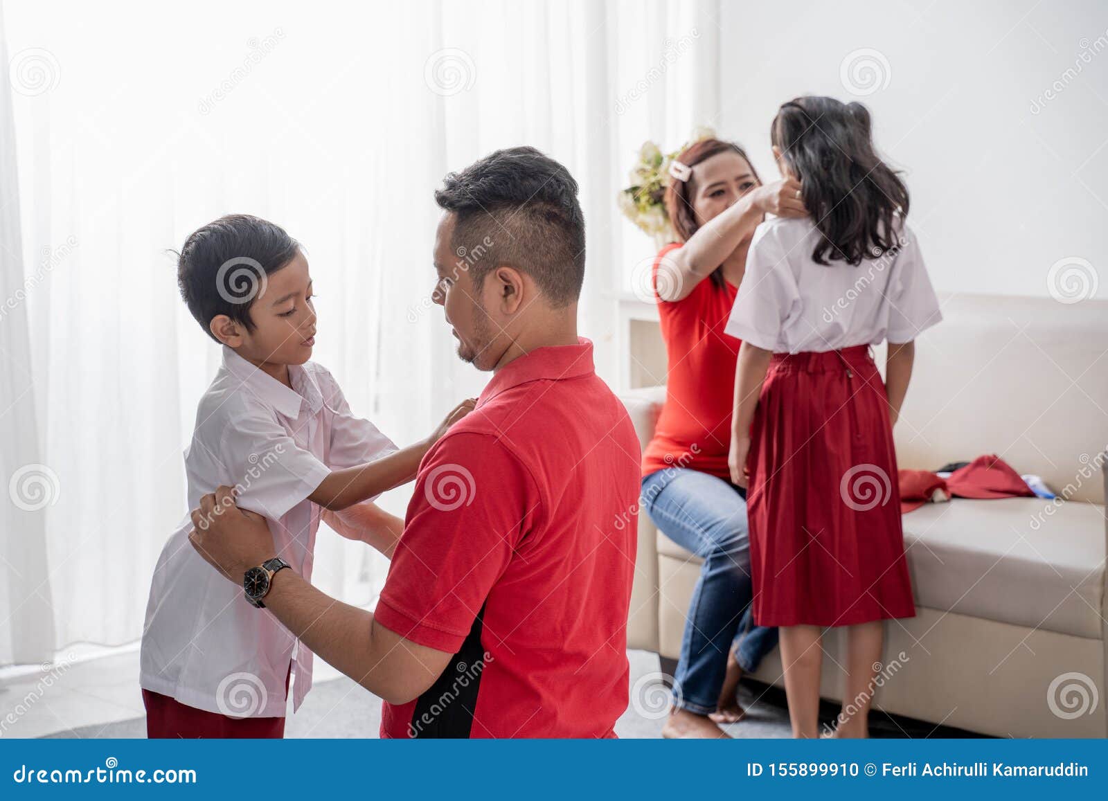 Parent Help Their Children Getting Ready for School Stock Photo - Image ...