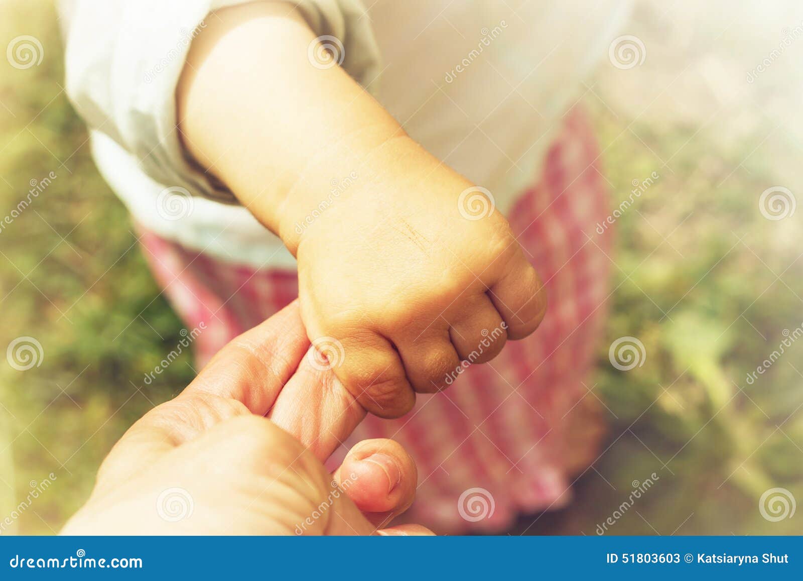 Parent Holds the Hand of a Small Child. Toned Stock Image - Image of ...