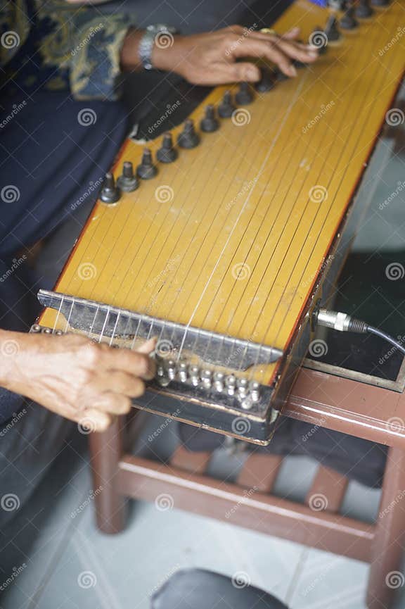 Parents Adjust Kecapi. on the Table Stock Photo - Image of vintage ...