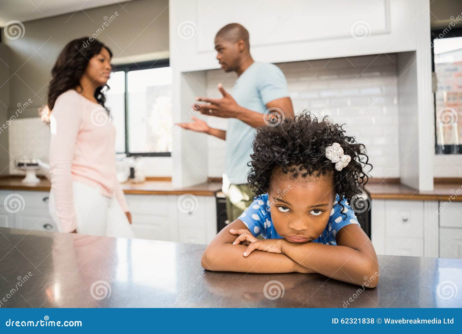 Parents Arguing in Front of Daughter Stock Photo - Image of family ...