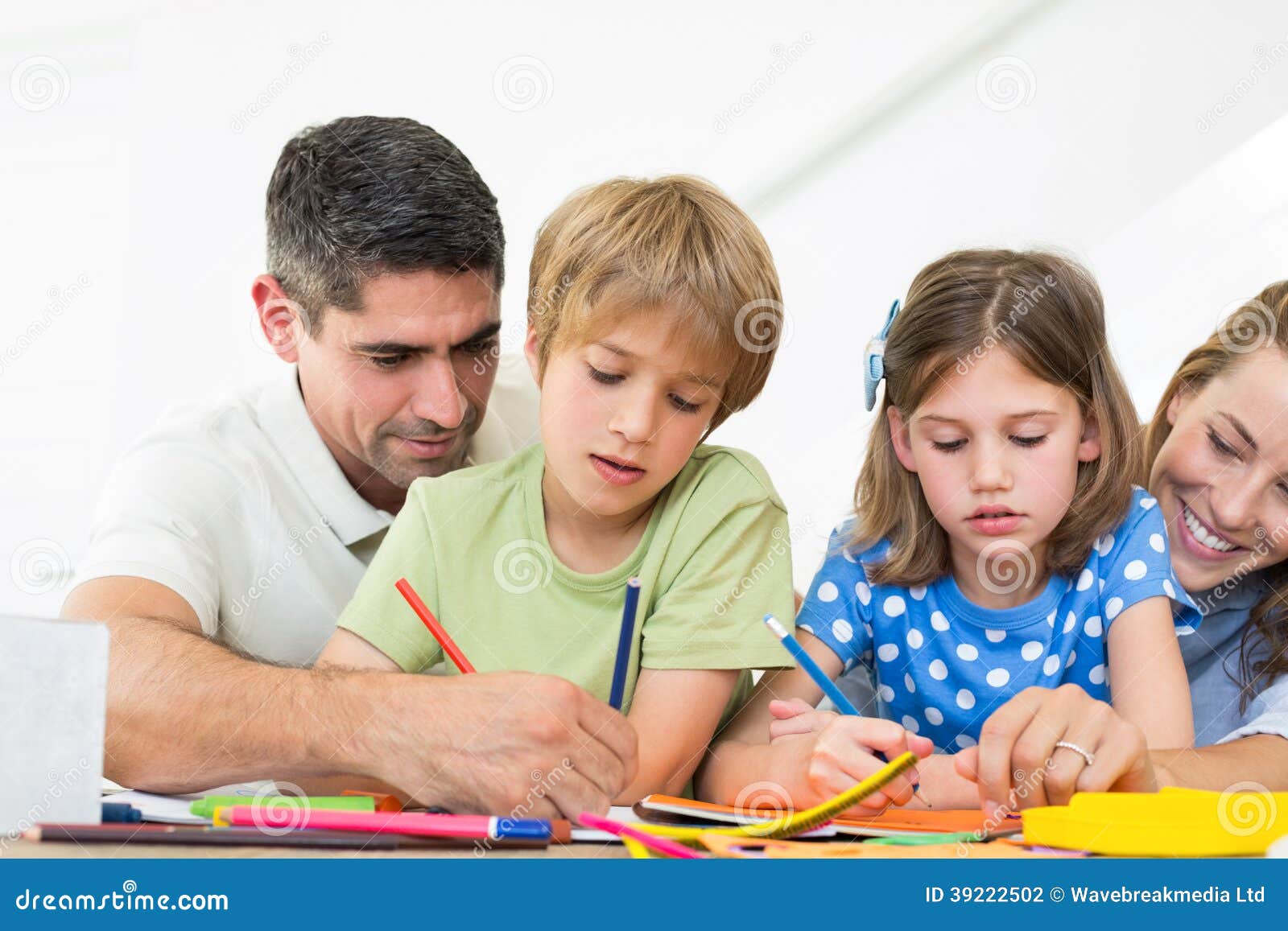 Parents Assisting Children in Coloring Stock Photo - Image of mature ...