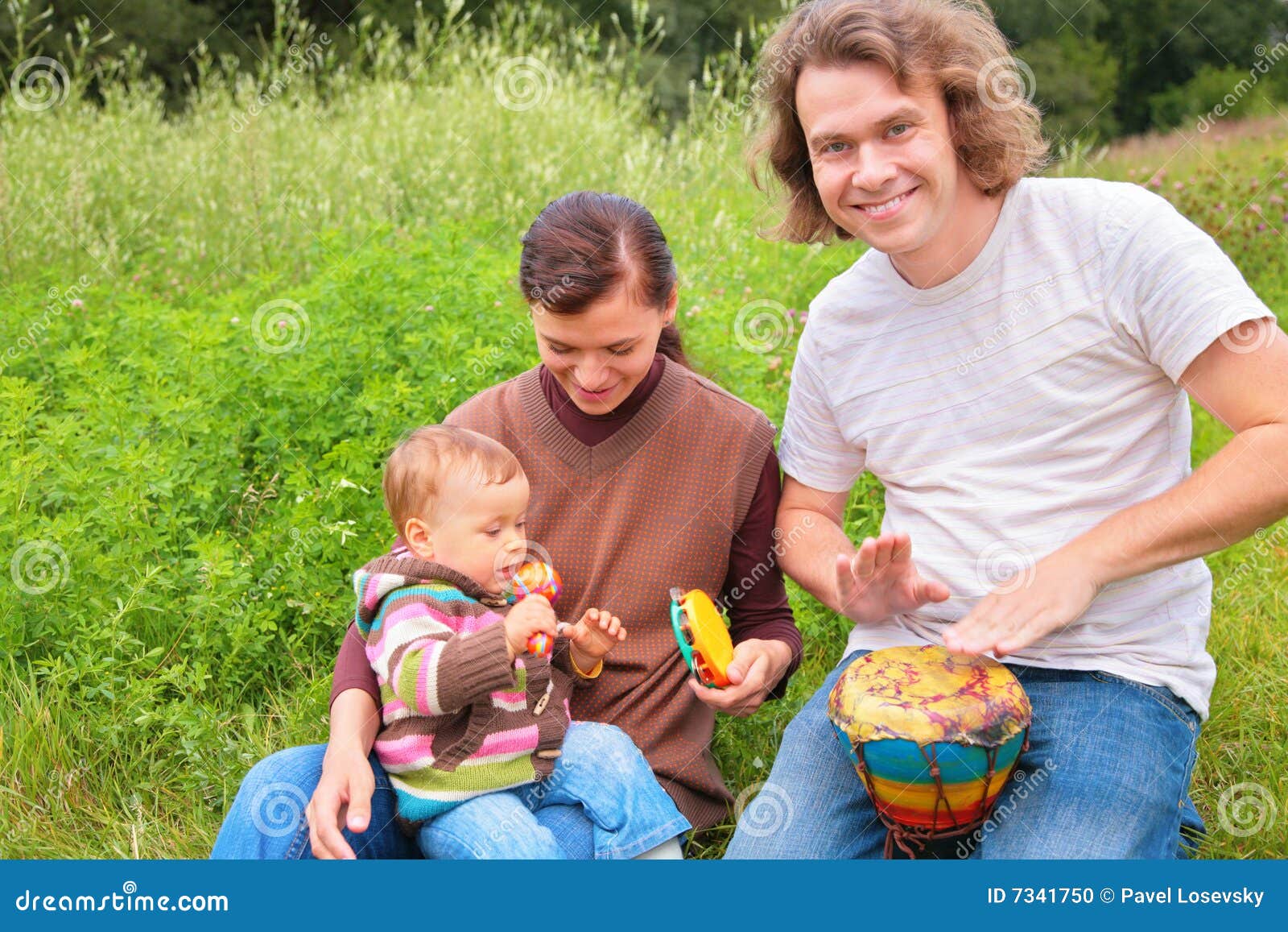 Parents and baby on nature stock photo. Image of childhood - 7341750
