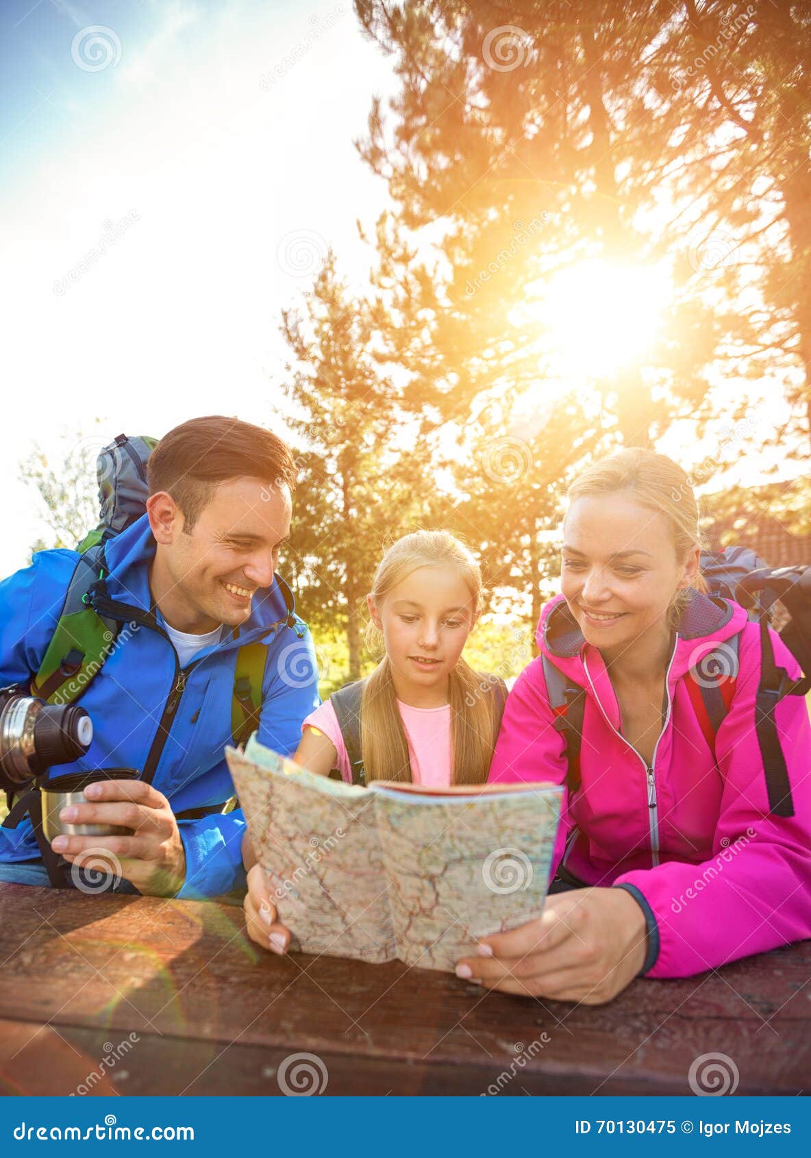 Parents and Child Looking Map Stock Image - Image of forest, recreation ...