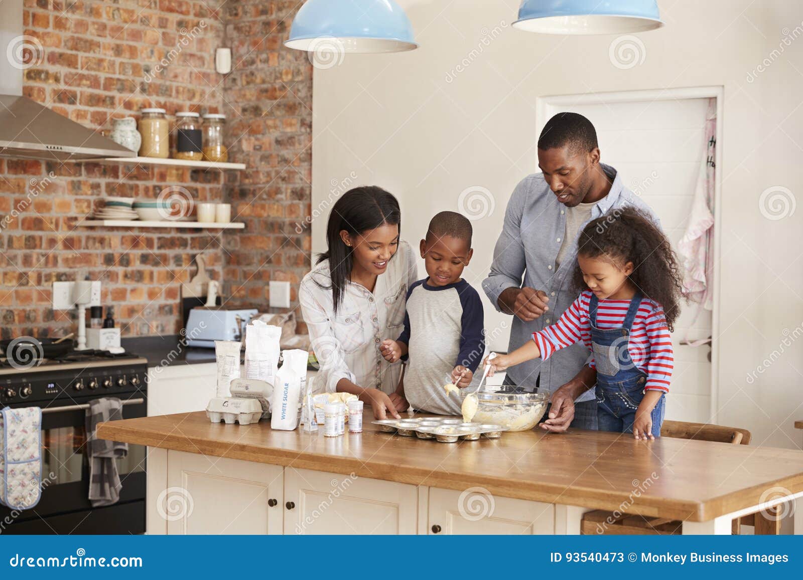 Parents and Children Baking Cakes in Kitchen Together Stock Image ...
