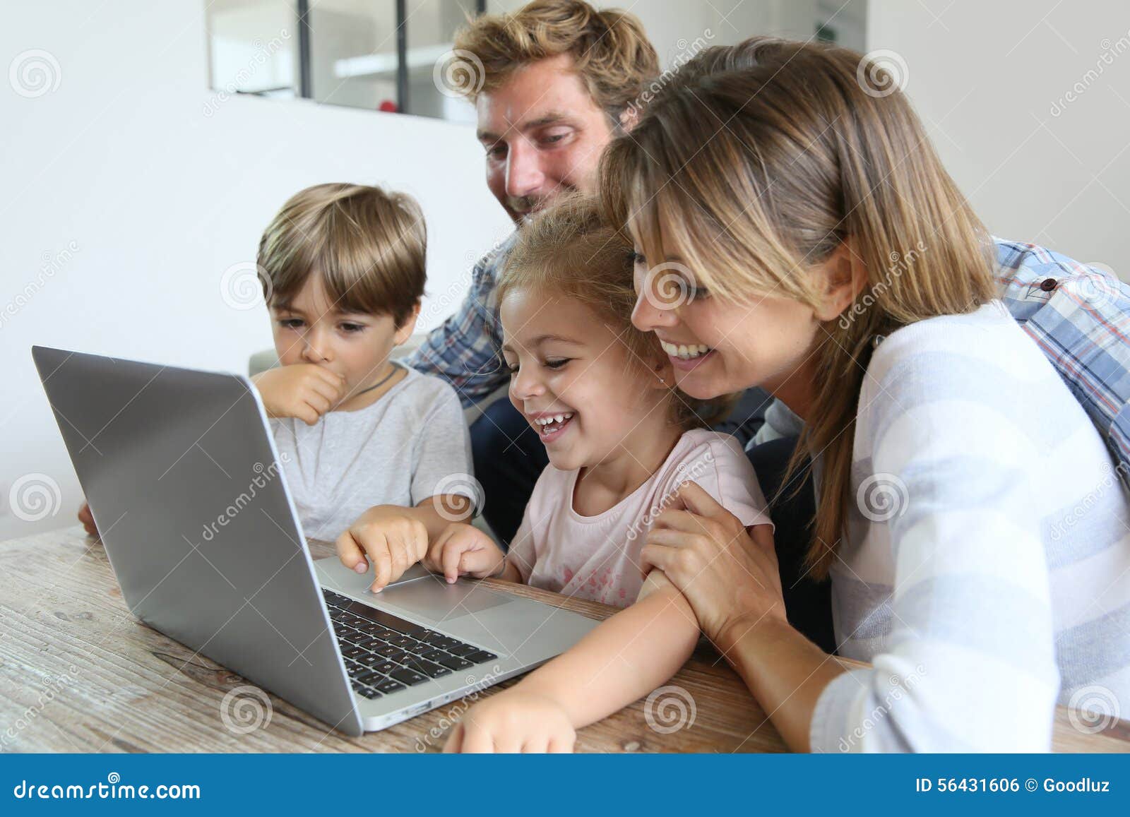 Parents with Children Playing on Laptop Stock Photo - Image of computer ...