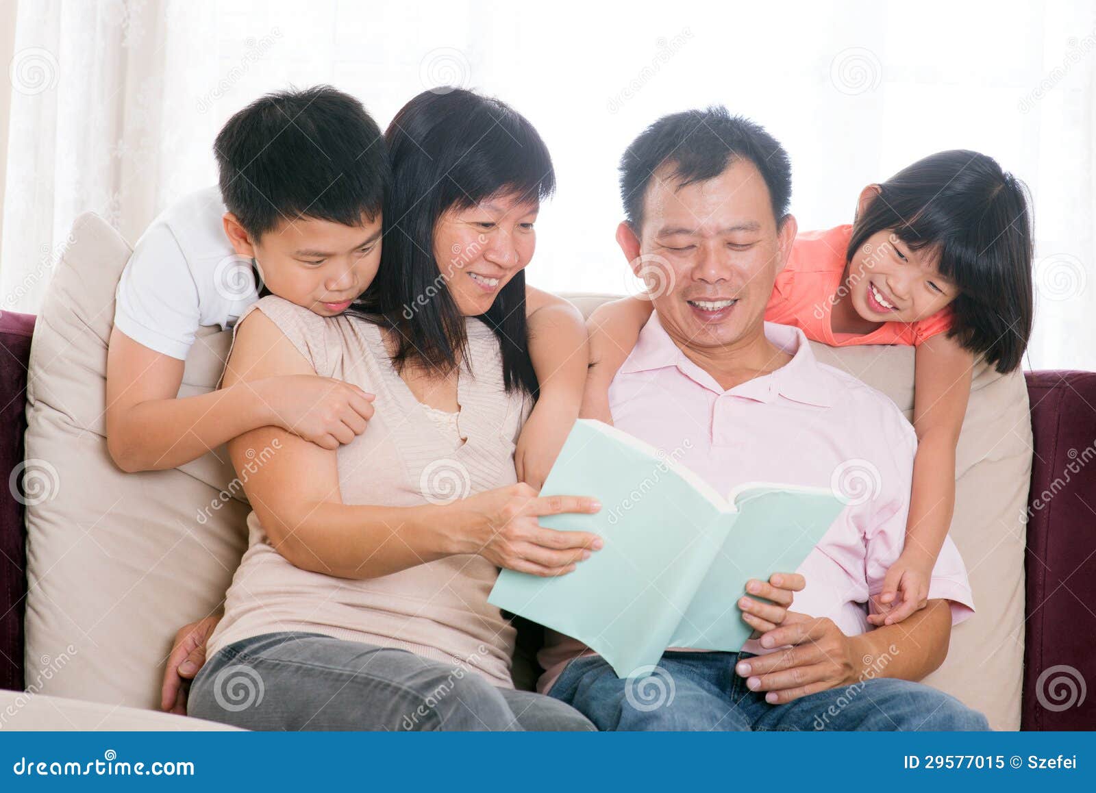 Parents and Children Reading Books at Home. Stock Image - Image of ...