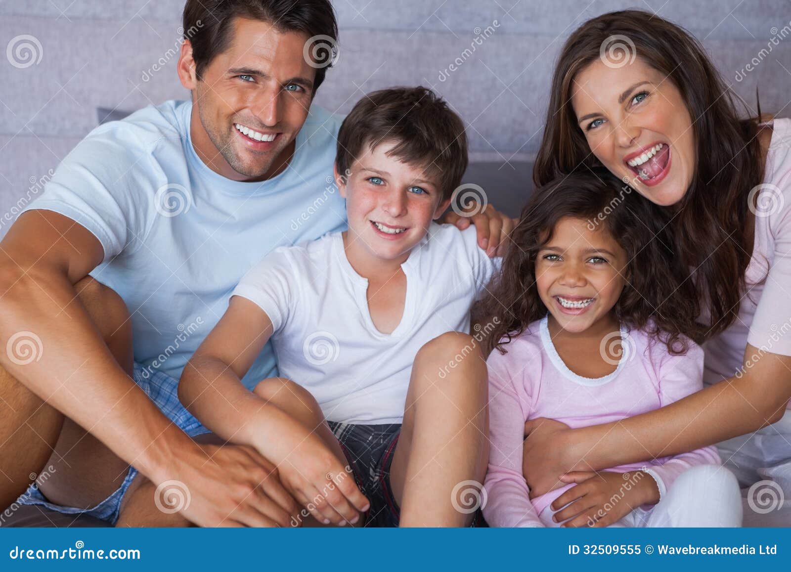 Parents and Children Smiling at Camera Stock Image - Image of indoors ...