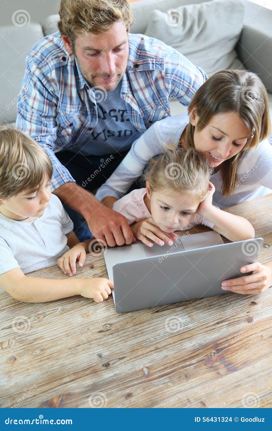 Parents and Children Spending Time Together at Home Stock Photo - Image ...