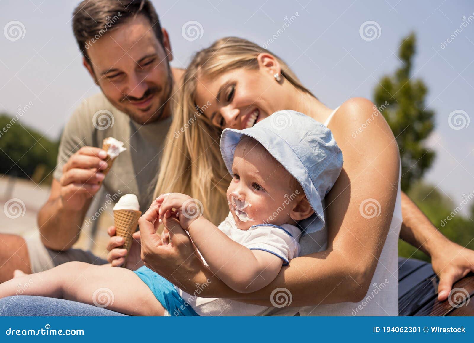 Parents Having Fun with Their Kid on a Beautiful Sunny Day Stock Image ...