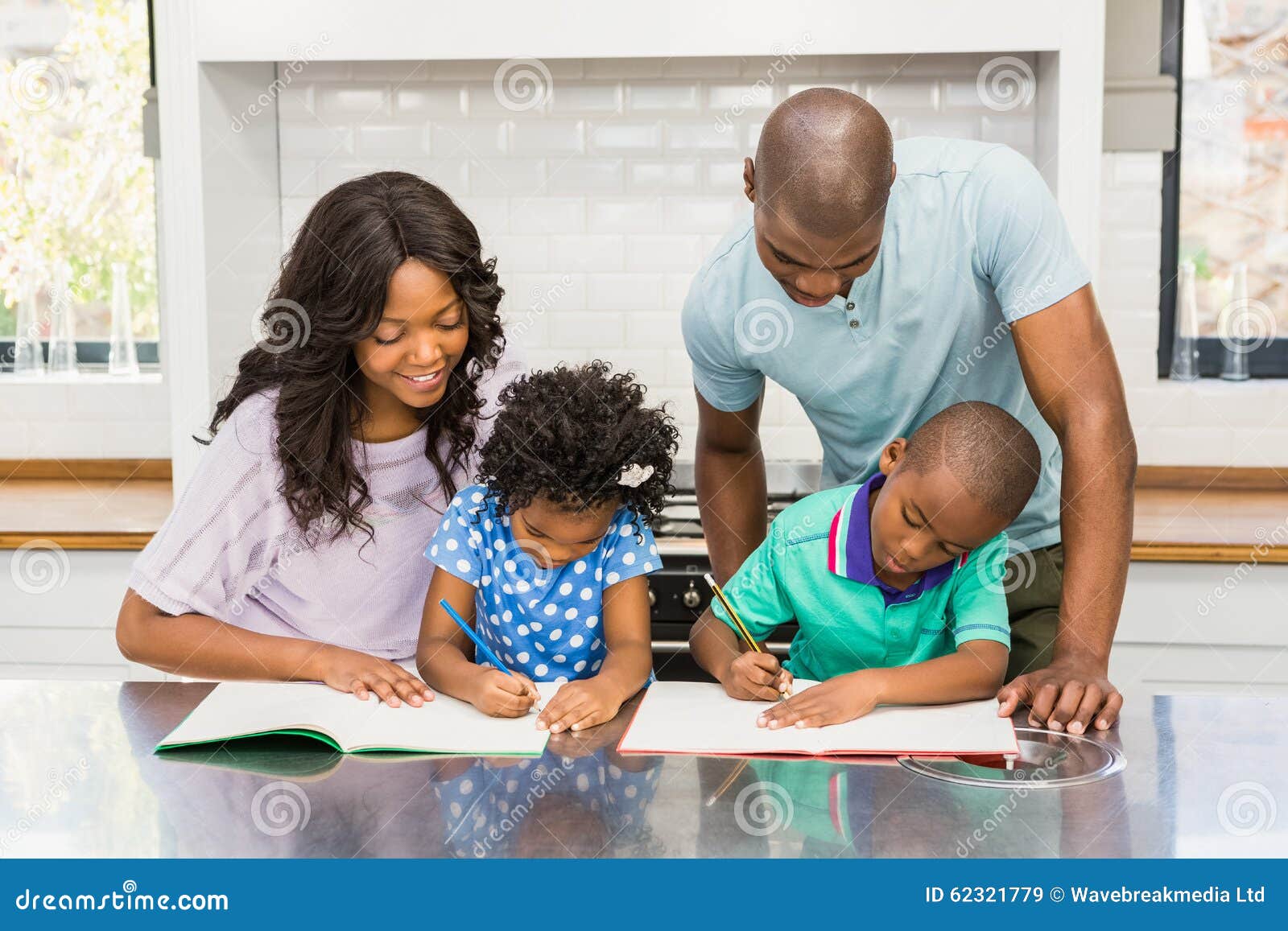 Parents Helping Children Doing Homework Stock Image - Image of father ...