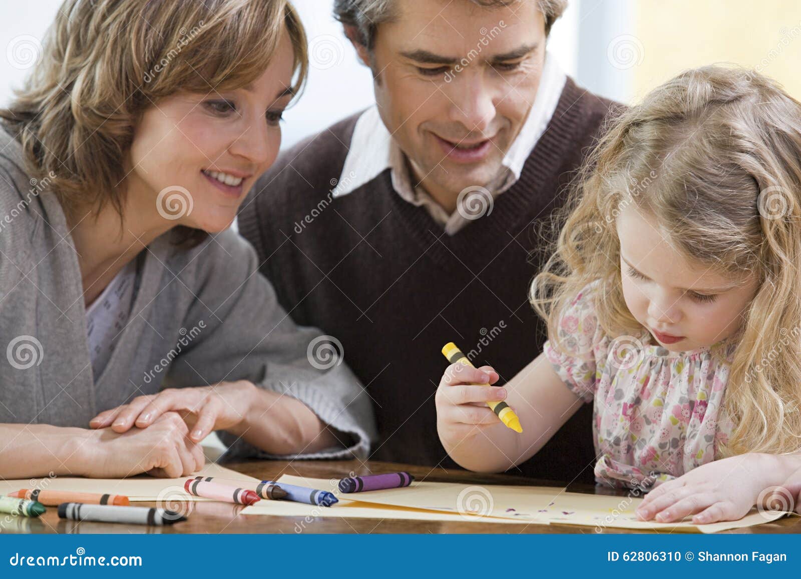 Parents Helping Their Daughter Draw Stock Photo - Image of drawing ...