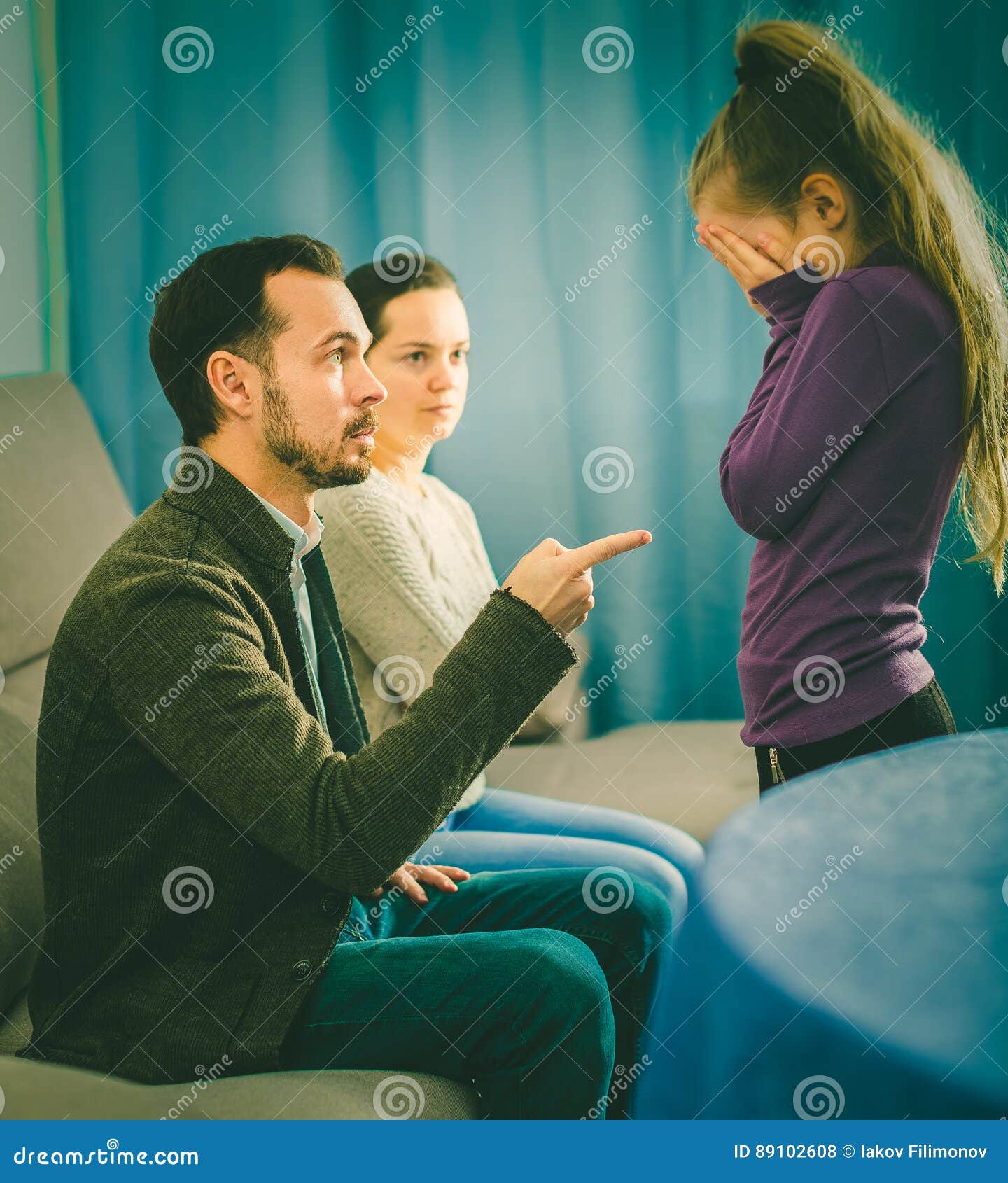 Parents lecturing daughter stock photo. Image of parents - 89102608