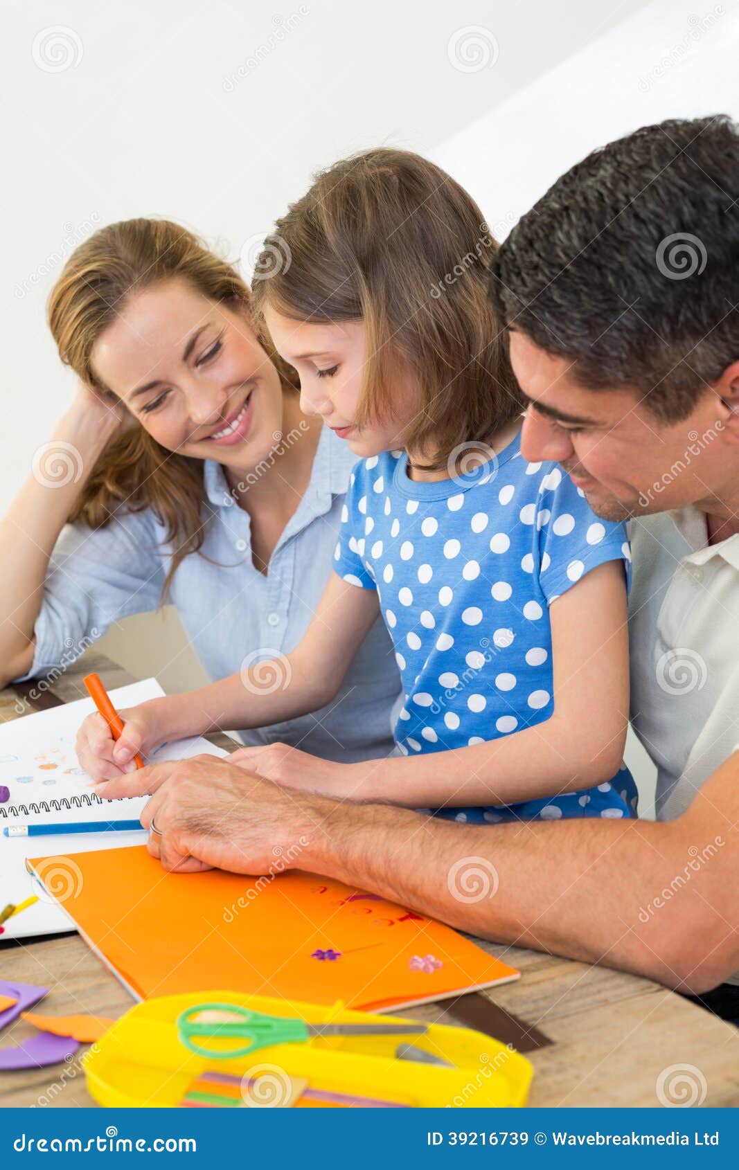 Parents Looking at Daughter Coloring Stock Image - Image of three ...