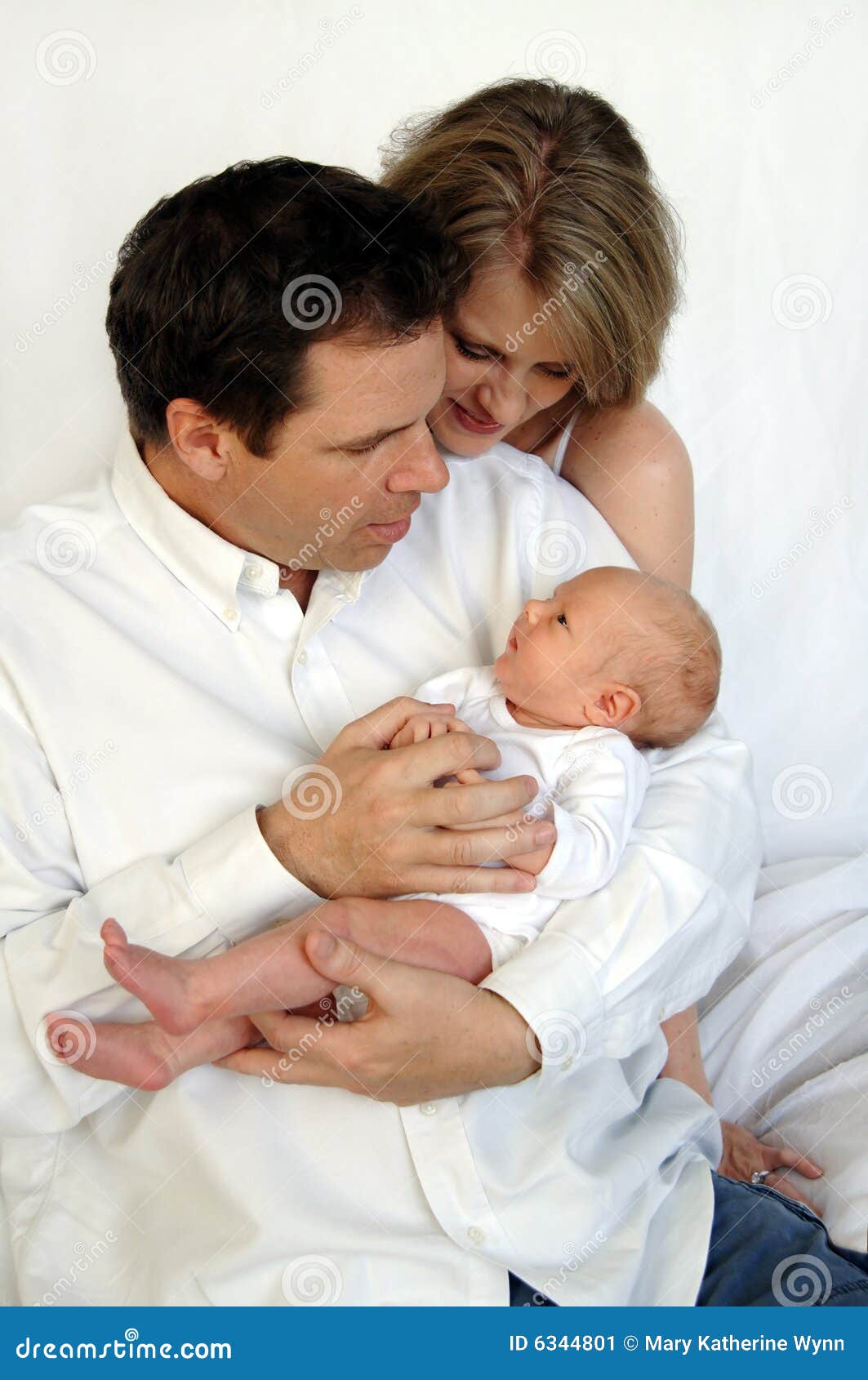 Parents with newborn baby stock image. Image of newborn - 6344801