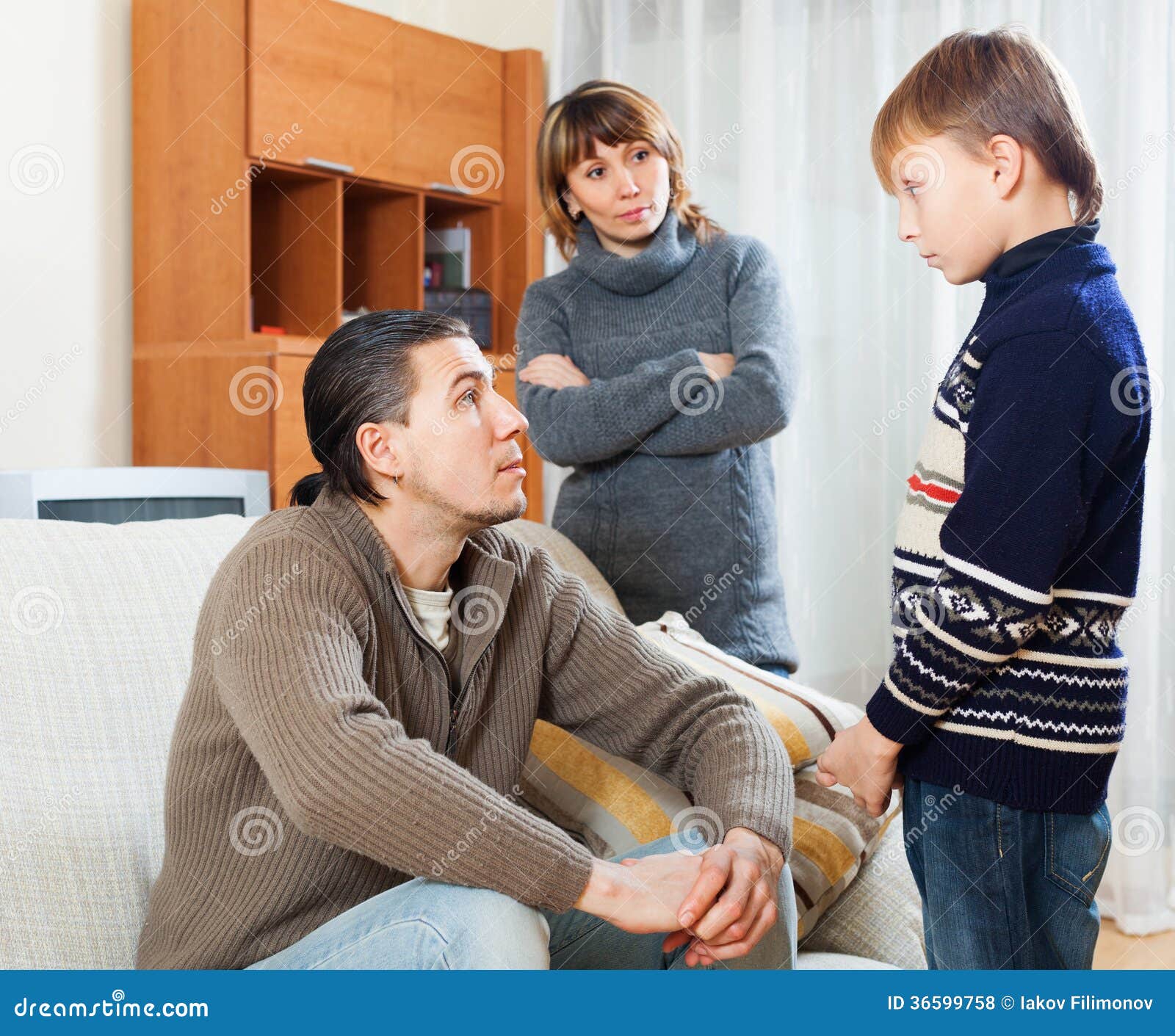 Parents Scolding Son in Home Stock Photo - Image of parenting, parent ...