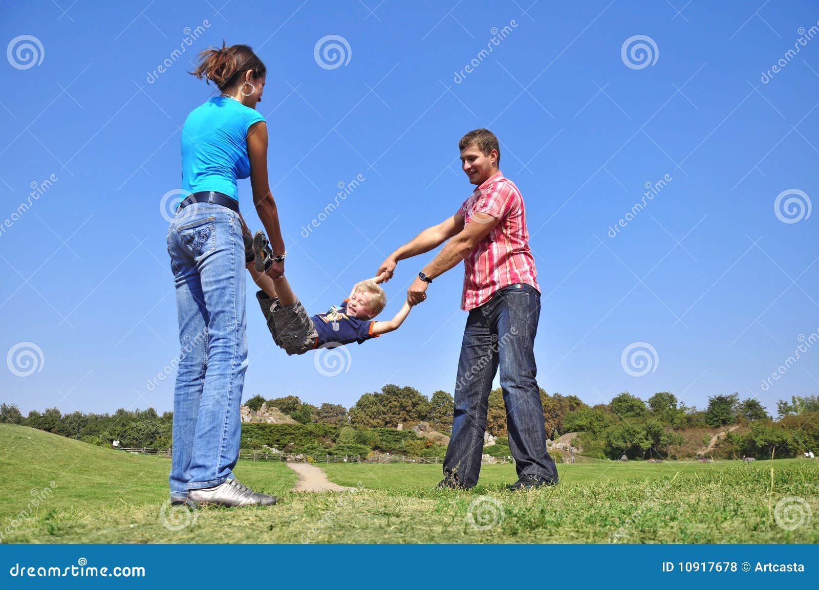 Parents shake their son stock photo. Image of cloud, infant - 10917678